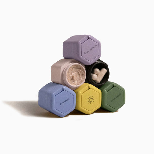 Magnetic & Refillable Travel Containers by Keep Your Cadence | Oscea